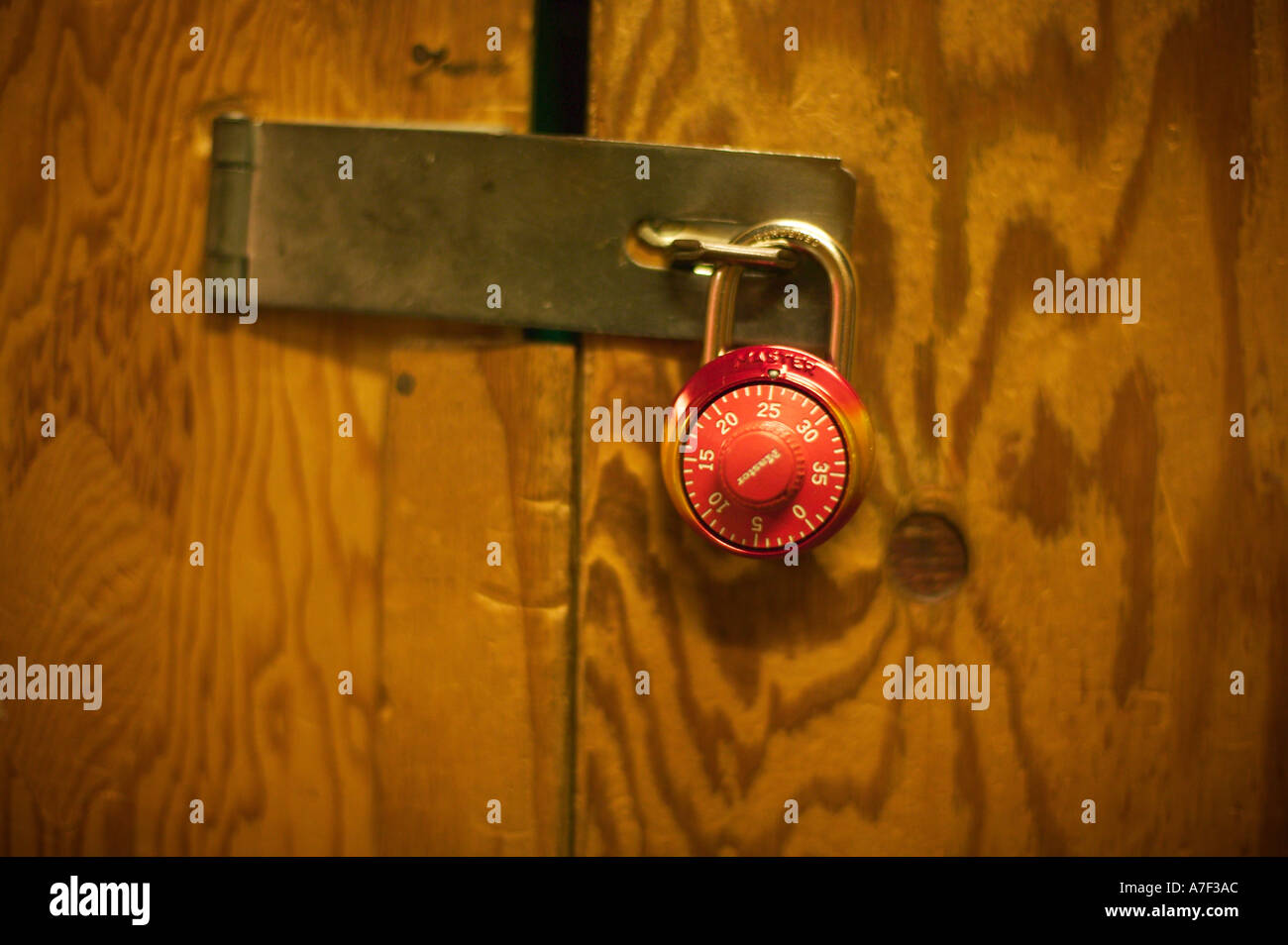Master combination lock with red dial Stock Photo - Alamy
