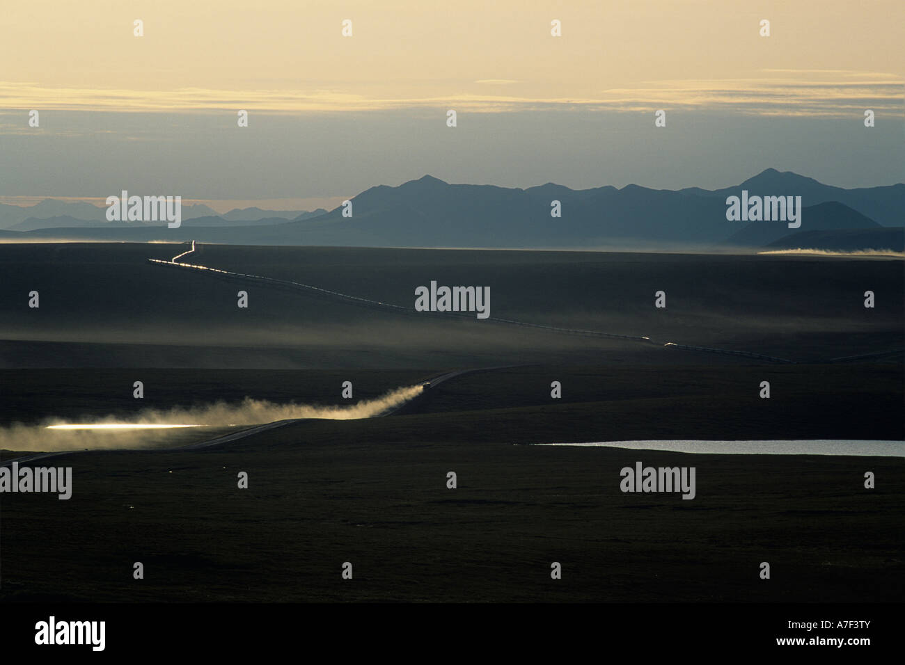 USA Alaska Truck raises cloud of dust driving along Dalton Highway at ...