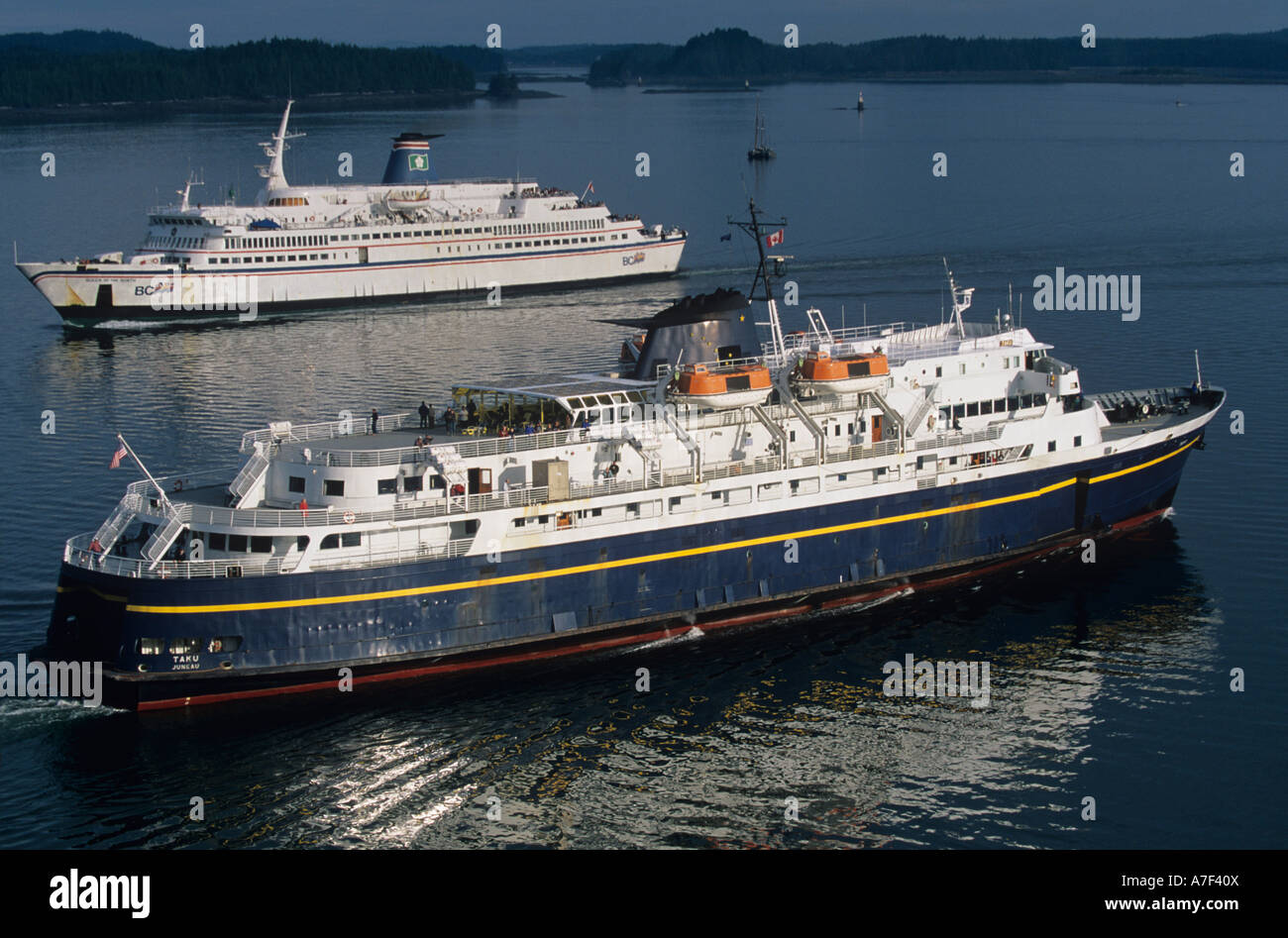 Canada British Columbia Alaska State Ferry sails past BC Ferry in ...