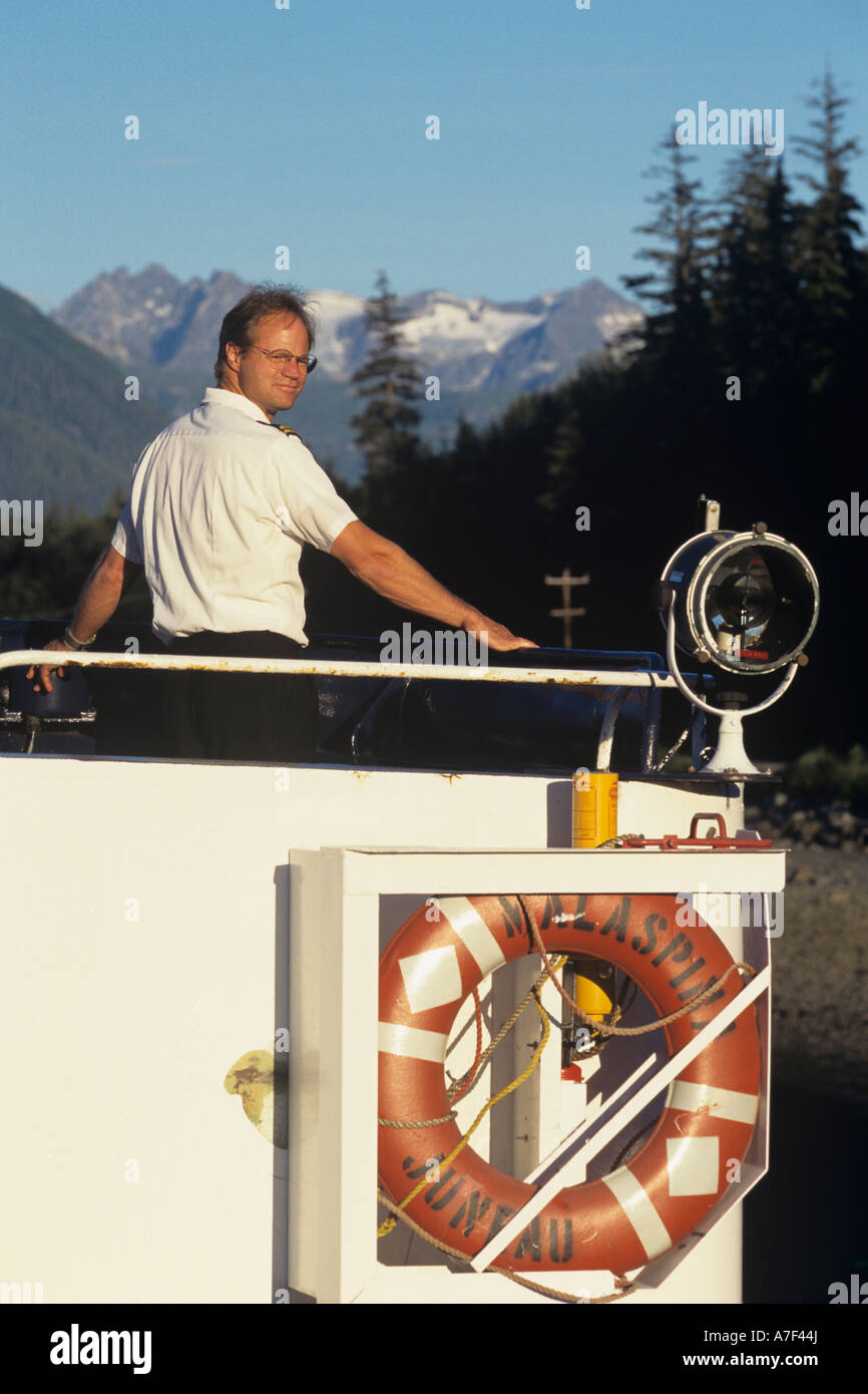 USA Alaska Captain pilots Alaska State Ferry toward dock in Haines in ...