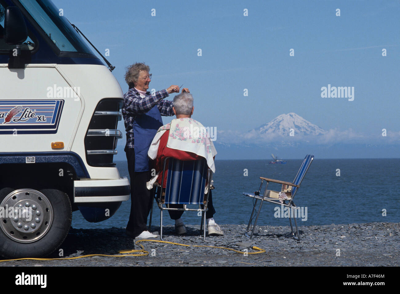 USA Alaska RV camper gets beach front haircut with view of Redoubt ...