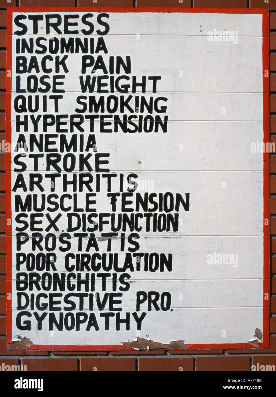 Sign listing various health and medical problems and illnesses Stock ...