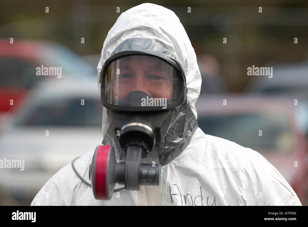 Man wearing biological protection suit and mask Stock Photo - Alamy