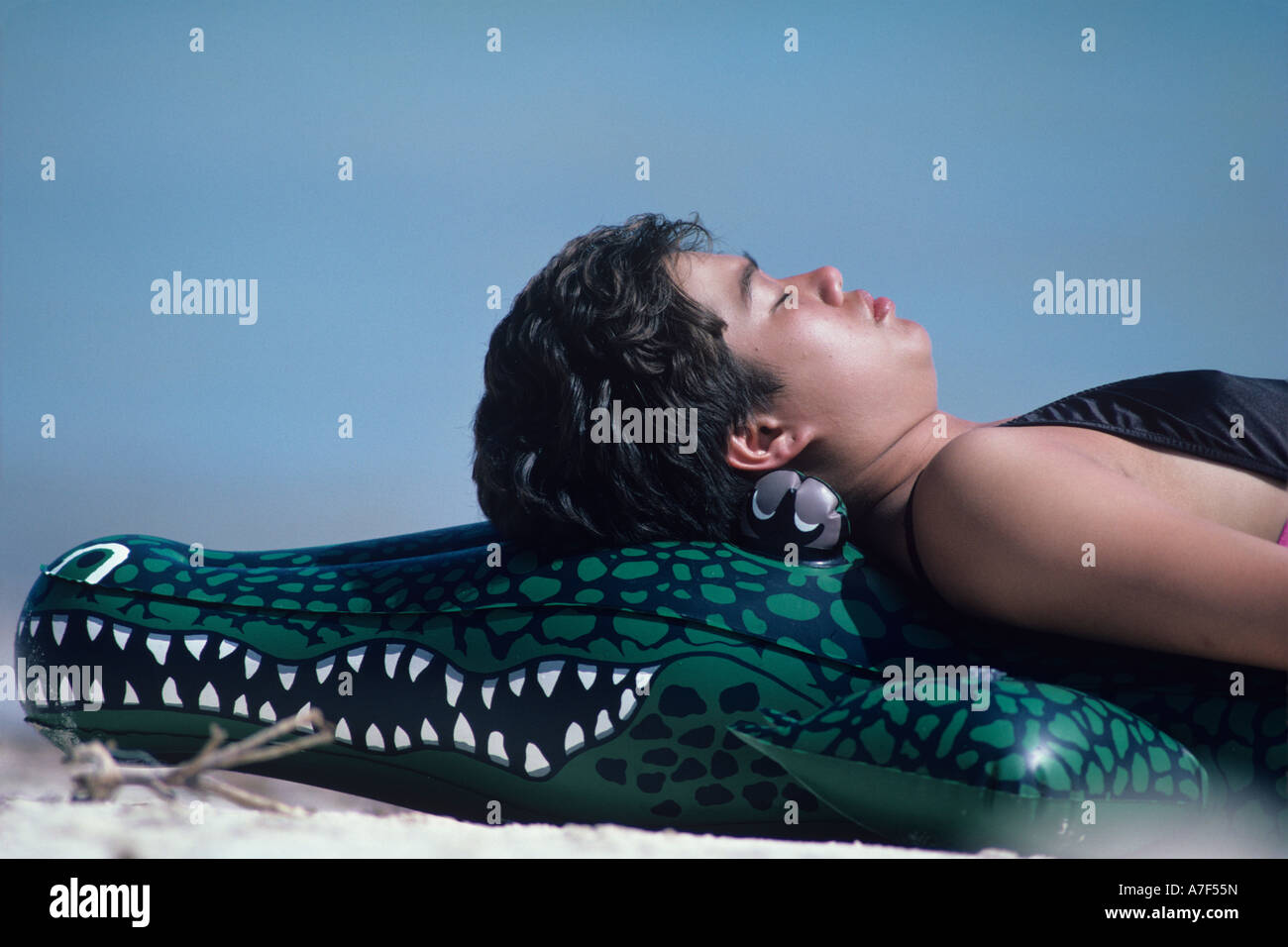 USA Florida College student naps on beach during spring break in Key ...