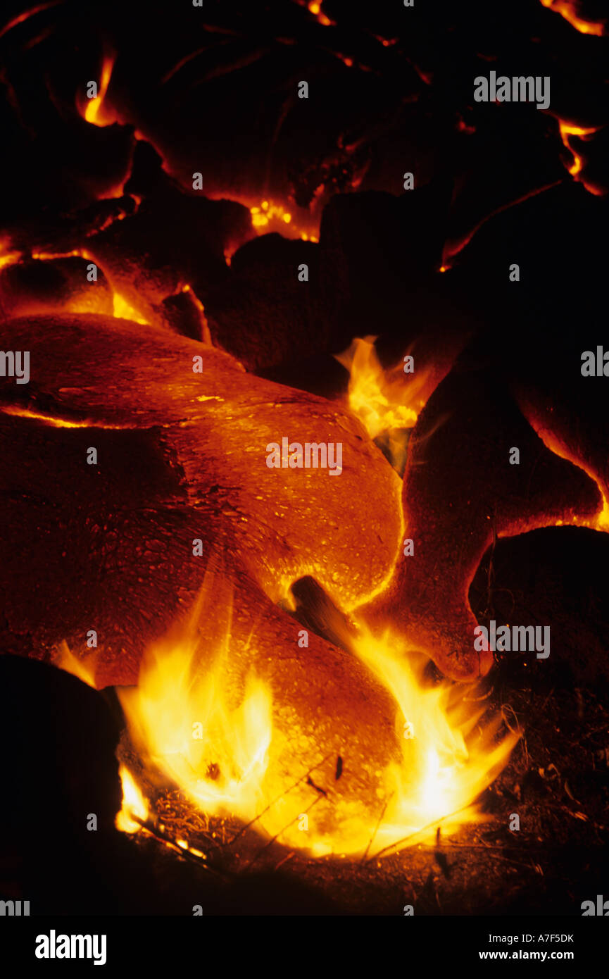 USA Hawaii Volcanoes National Park Flames at leading edge of molten ...