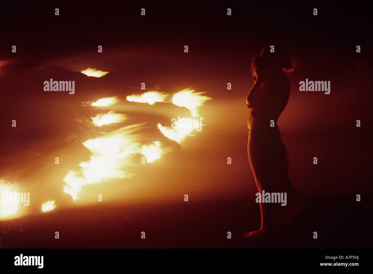 USA Hawaii Volcanoes National Park Woman stands by lava from Kilauea ...