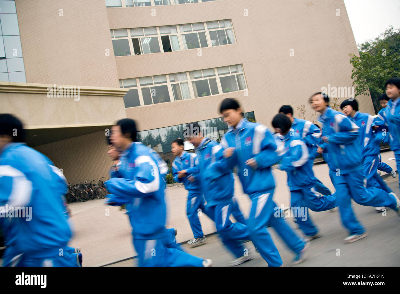 CHINA BEIJING Chinese high school students are a blur as they jog Stock ...