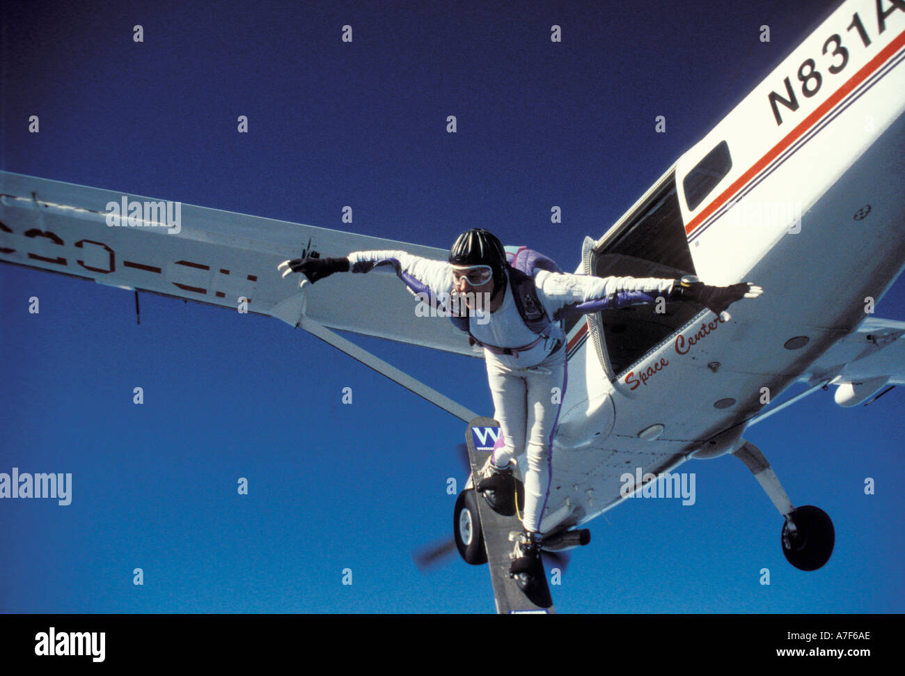 Action shot of Sky surfer having just come out of the plane with full ...