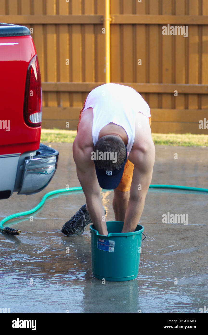 washing carwash truck red automobile auto vehicle water soap teenager ...