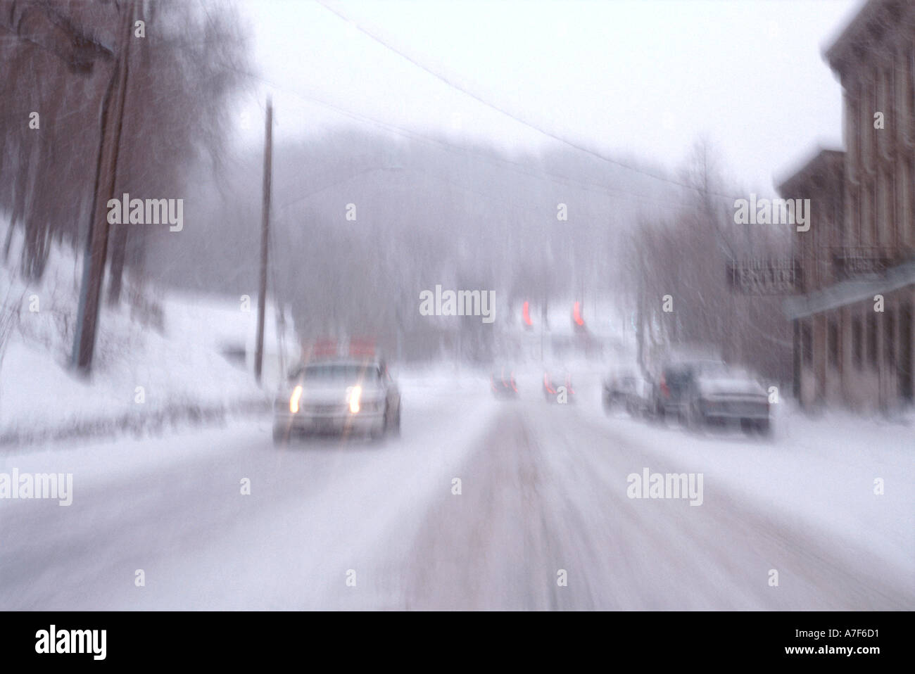 A police car on patrol during snowstorm Stock Photo - Alamy