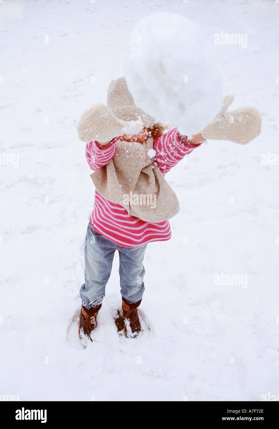 Child throw ball up hi-res stock photography and images - Alamy
