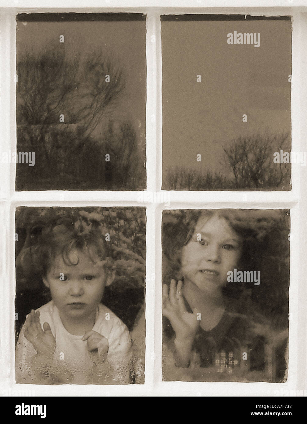 Two Faces Behind Window Stock Photo - Alamy