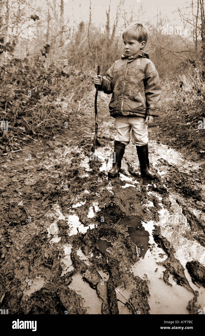 Wellington boots boy mud hi-res stock photography and images - Alamy
