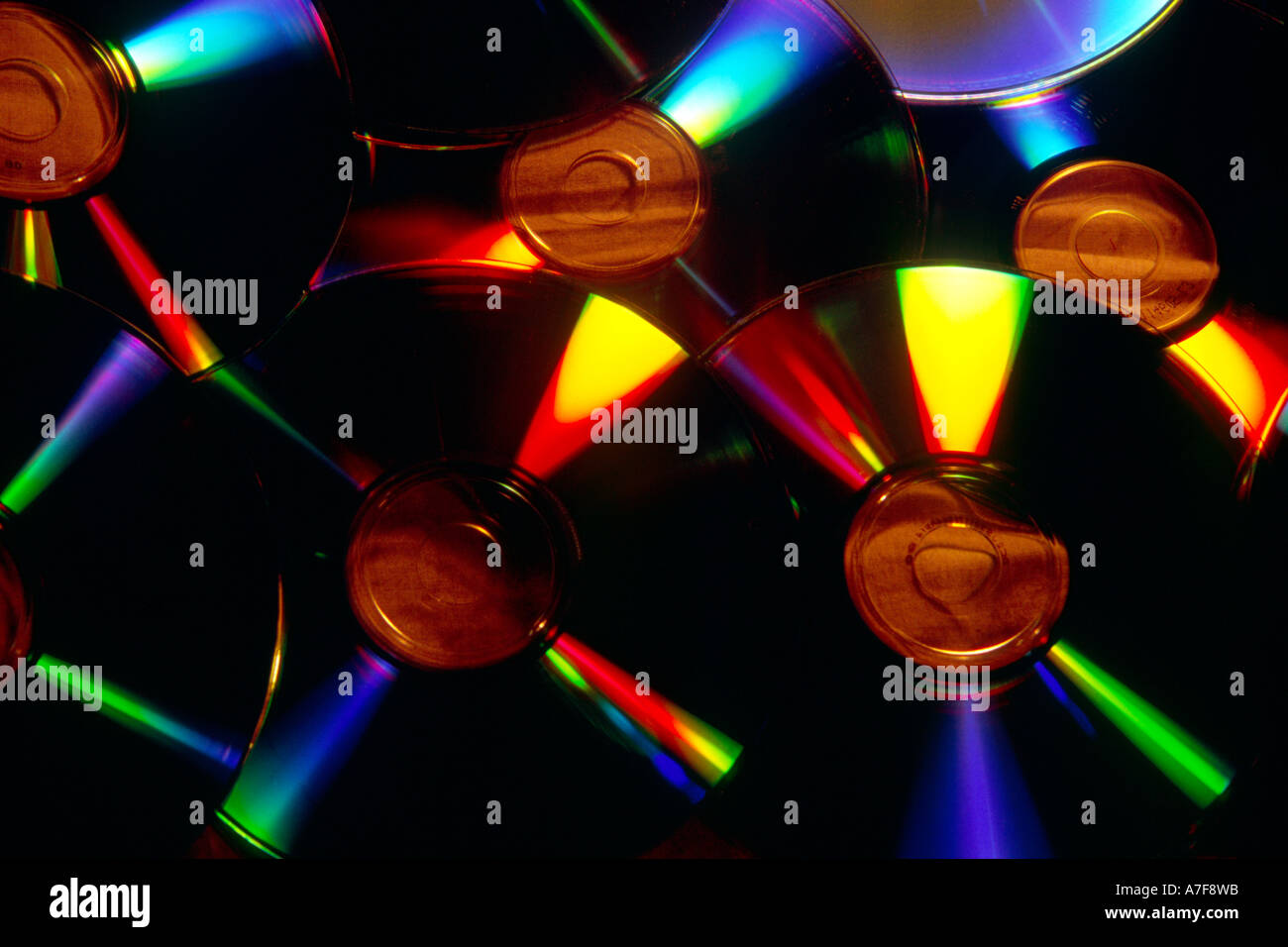 Light refracted by CDs Stock Photo - Alamy