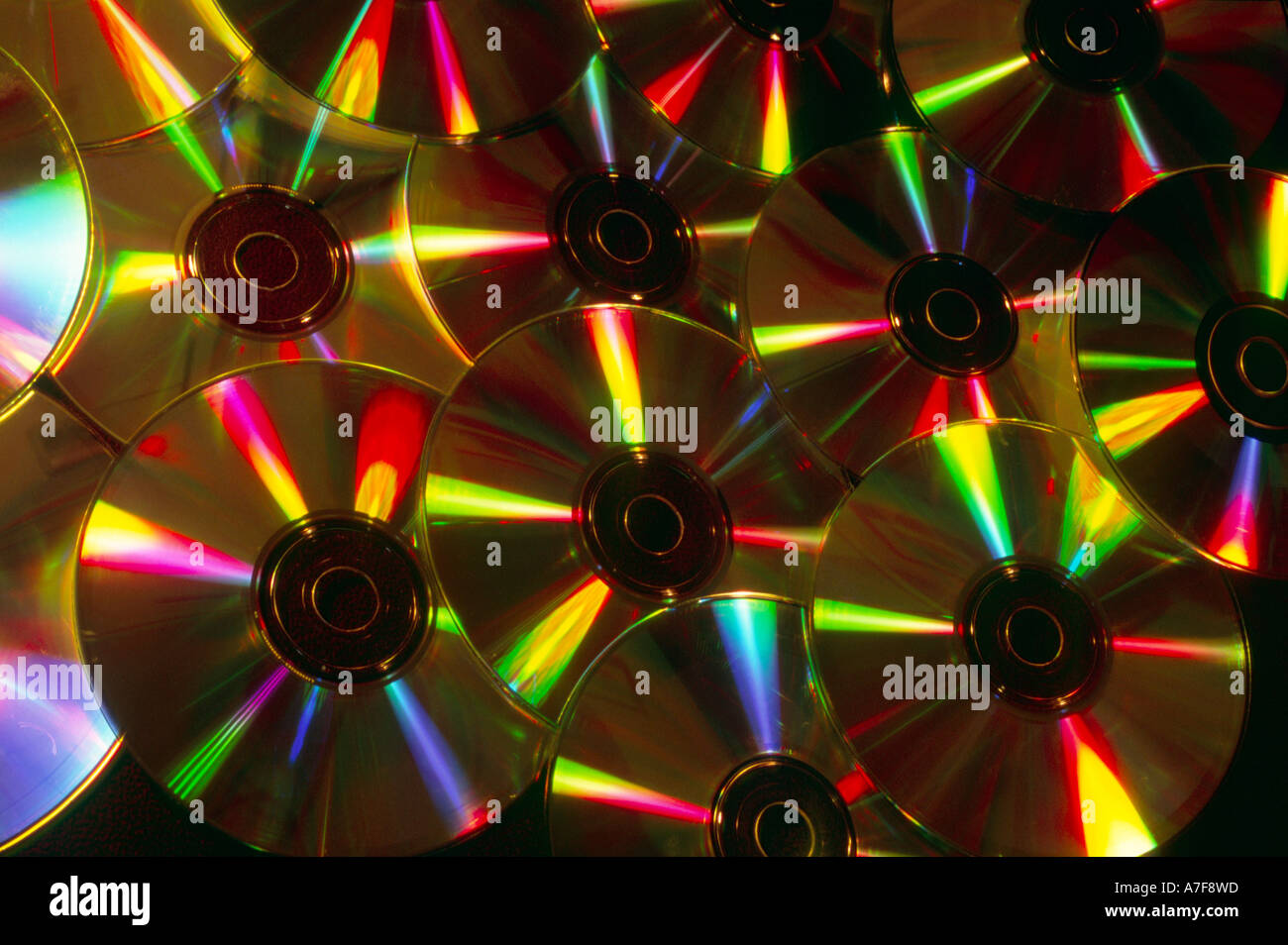 Light refracted by CDs Stock Photo - Alamy