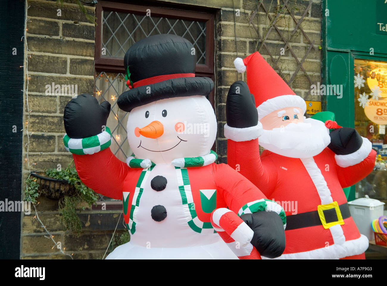 Inflatable christmas snowman and santa hi-res stock photography and ...