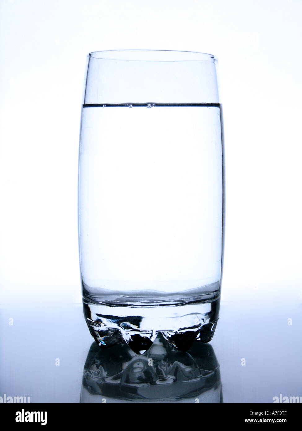 Glass of water on white background Stock Photo - Alamy