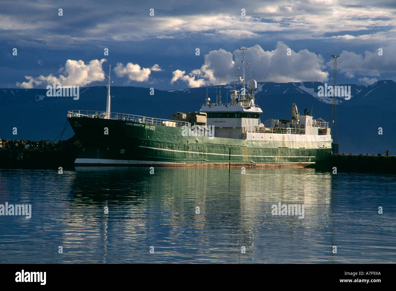 Evening light on boat Husavik Iceland Stock Photo - Alamy