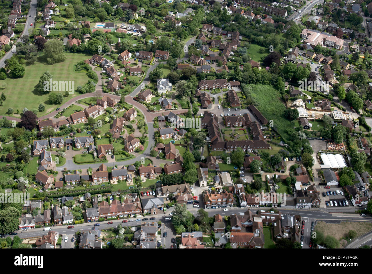 High level oblique aerial view south west of residential buildings in ...