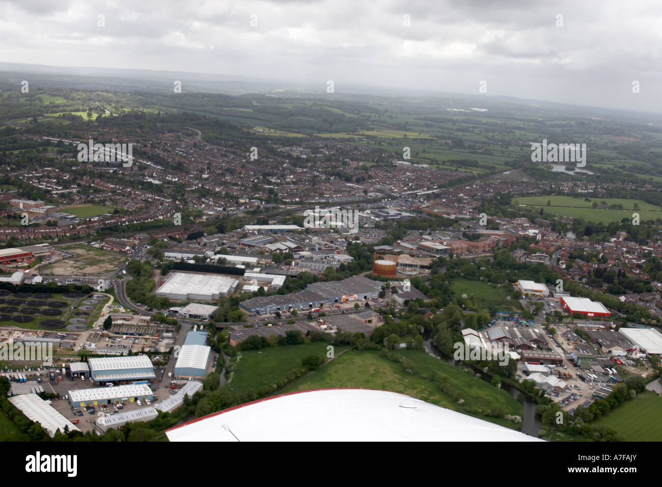 High level oblique aerial view north east of water works and railway ...