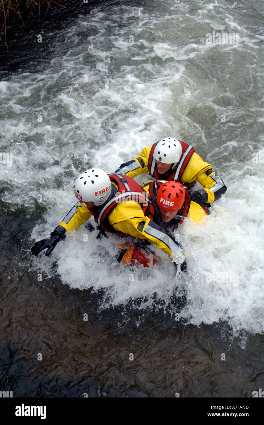 Firefighters training in river rescue, Britain UK Stock Photo - Alamy