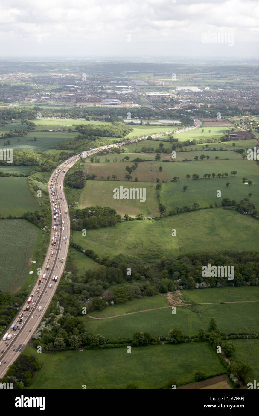 High level oblique aerial view east of M25 towards Waltham Cross fields ...