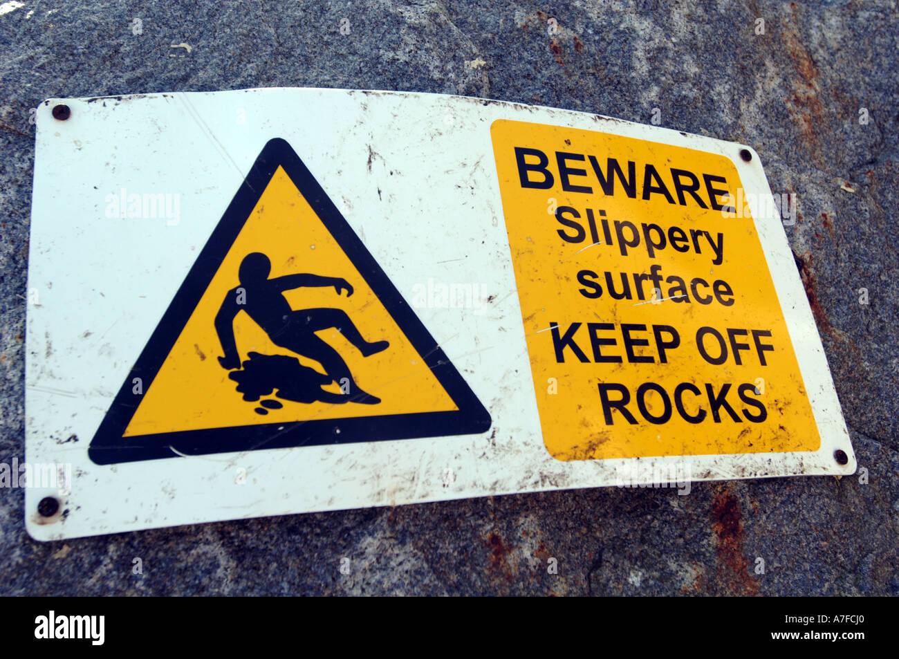 Warning signs on rocks at West Bay, Dorset Britain UK Stock Photo - Alamy
