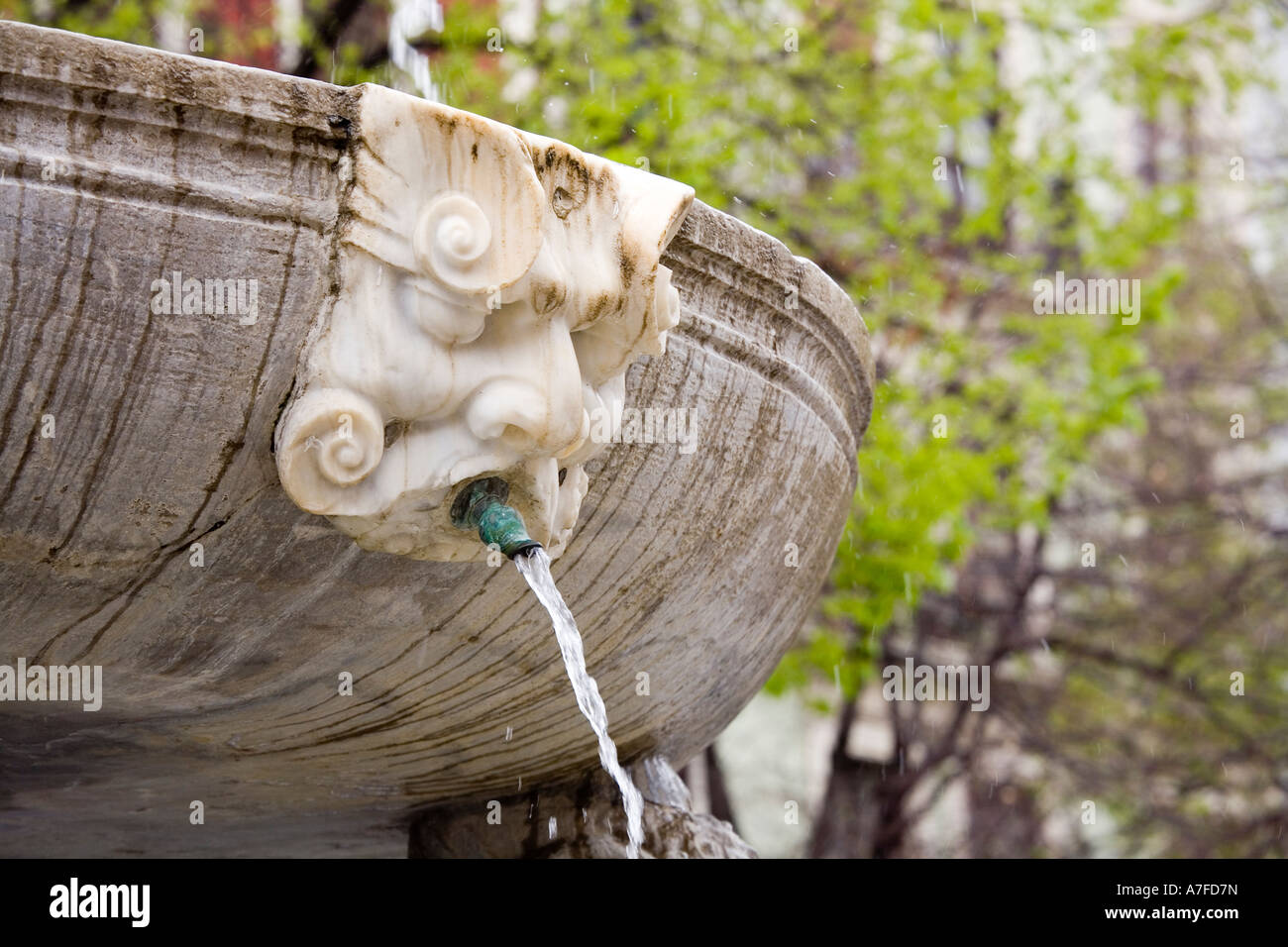 Marble face carved into fountain Granada Spain Stock Photo - Alamy