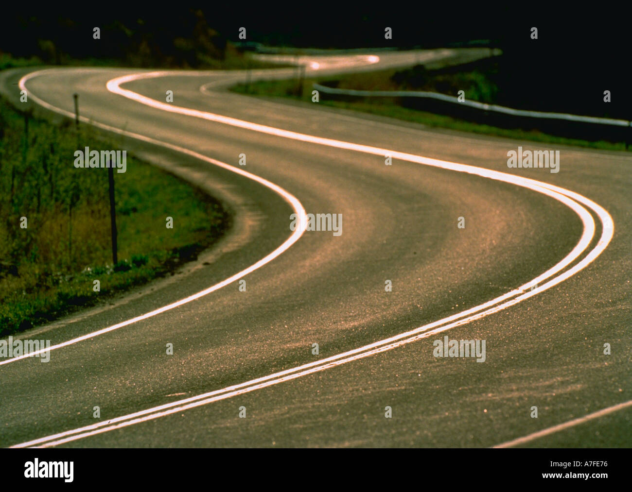 Two land highway curves Stock Photo - Alamy
