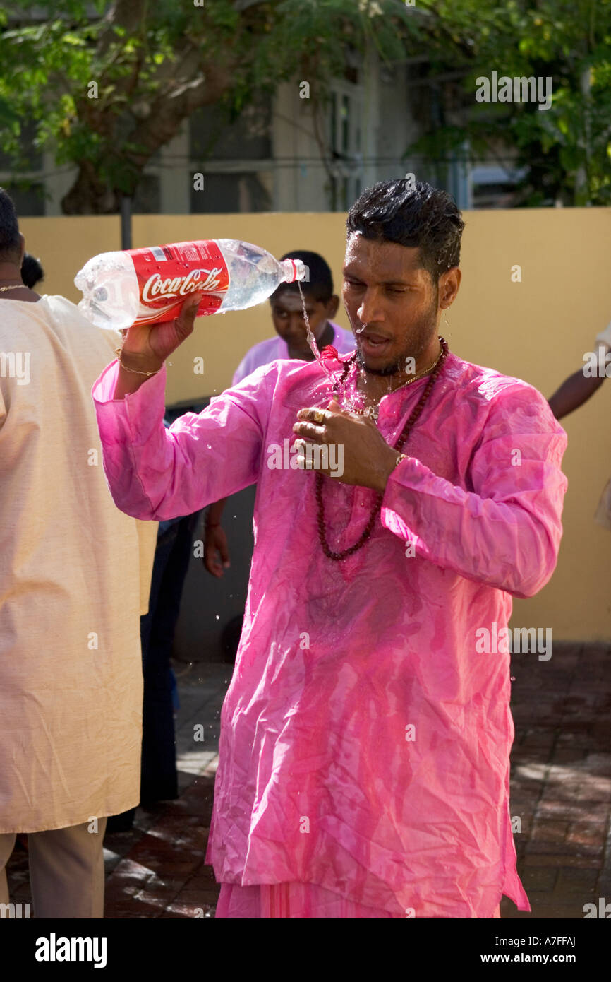 Body purification by Tamil worshiper Stock Photo - Alamy