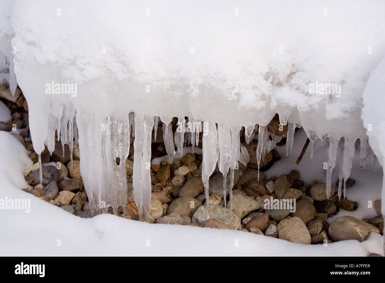 the icicles snow and gravel Stock Photo - Alamy