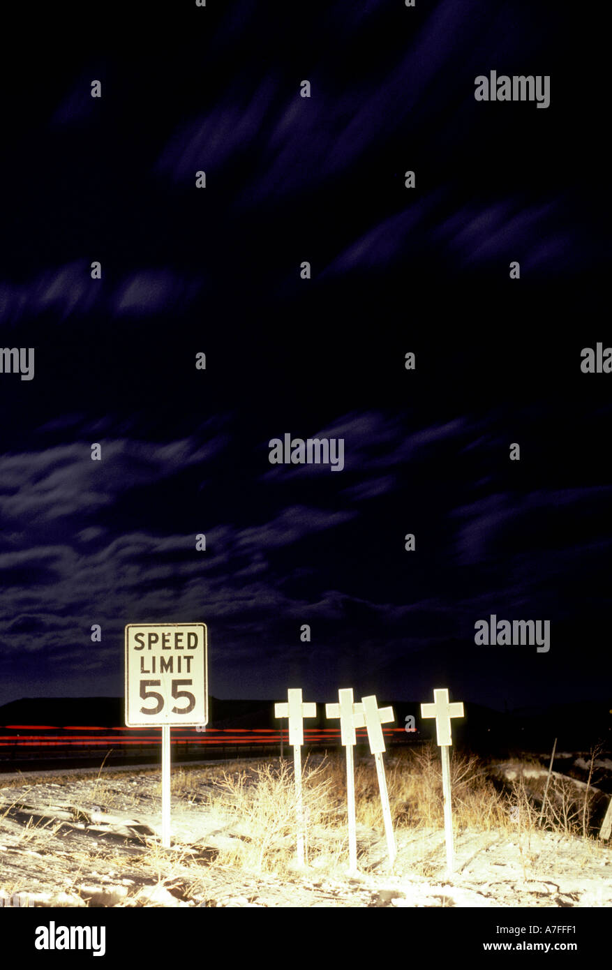 Roadside accident memorial crosses and speed limit sign on U Highway 10 ...