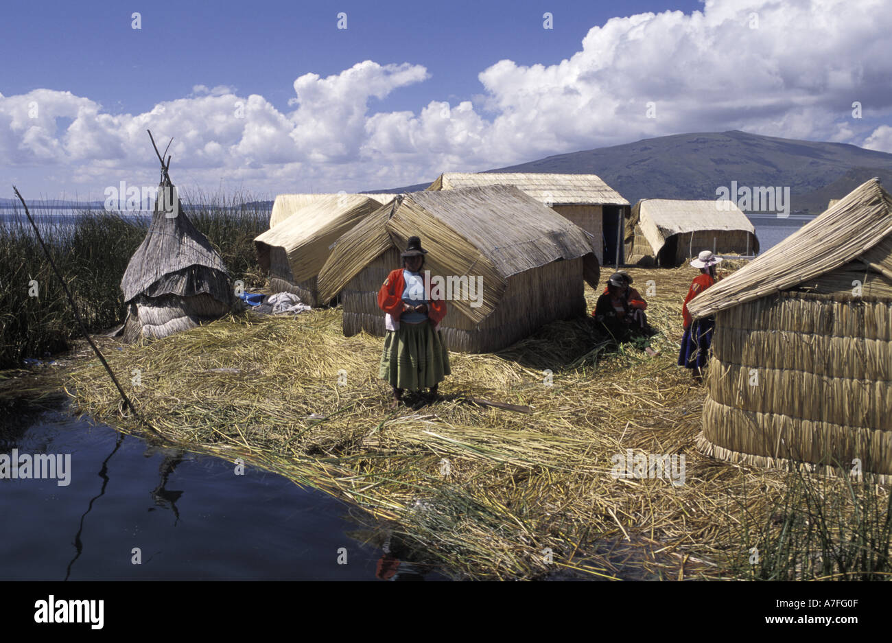 South America, Peru, Straw huts on a straw island with local Peruvians ...