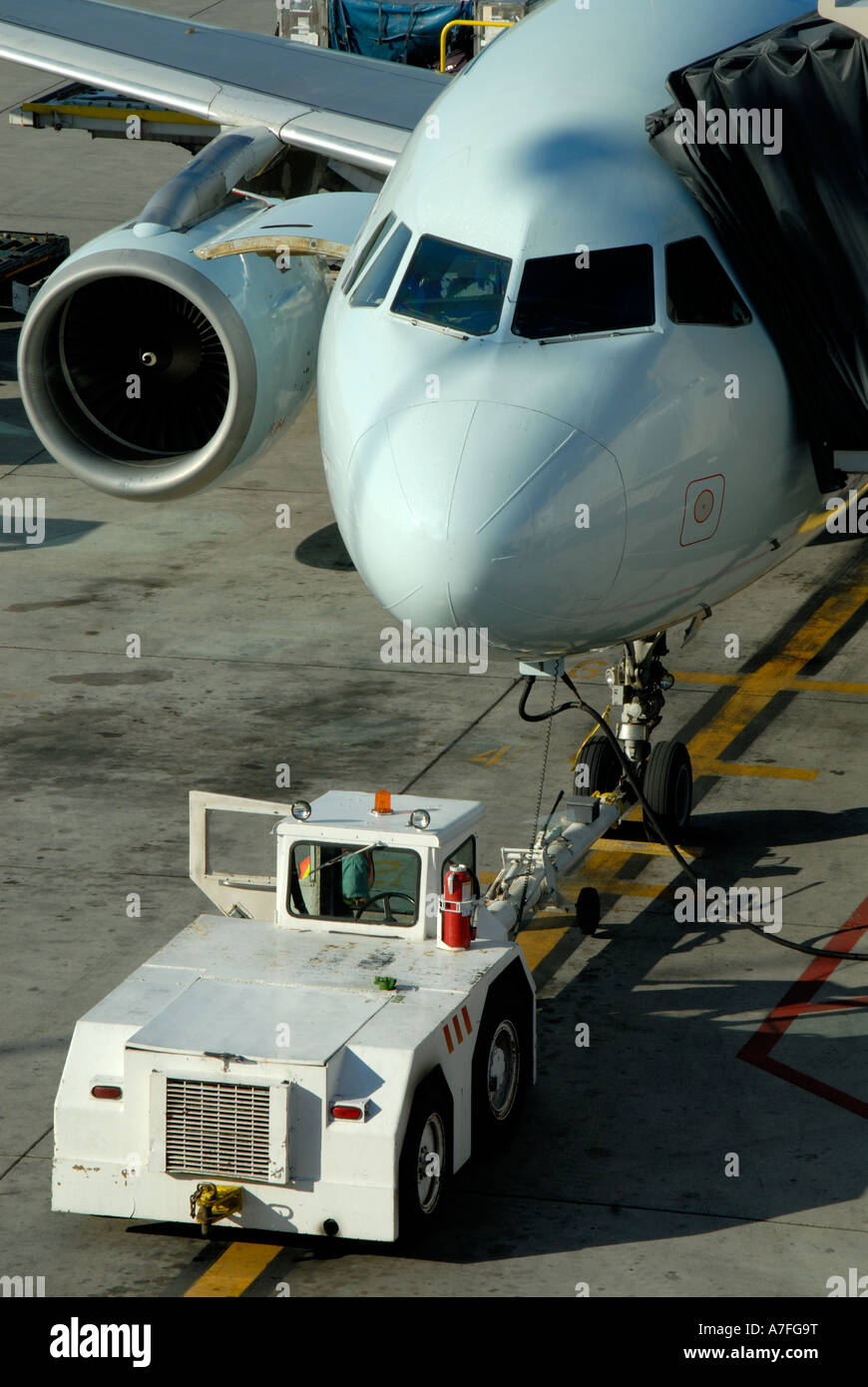 Commercial Airline Airbus Jet Aircraft At The Passenger Gate Jetway At ...