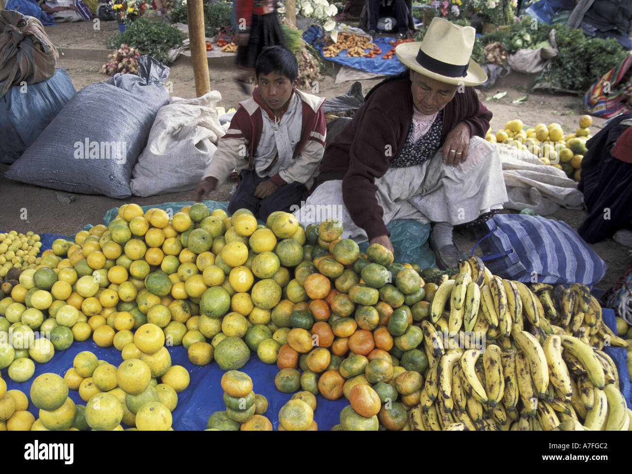 SA, Peru, Chinchero Fruit sellers in everyday dress, Chinchero market ...