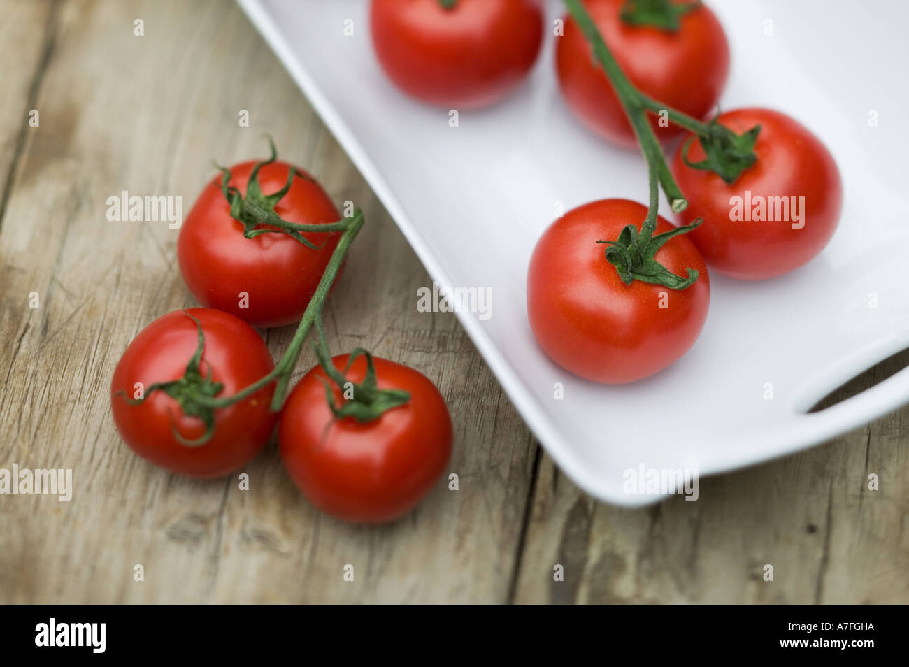 Cherry roma tomatoes in hi-res stock photography and images - Alamy