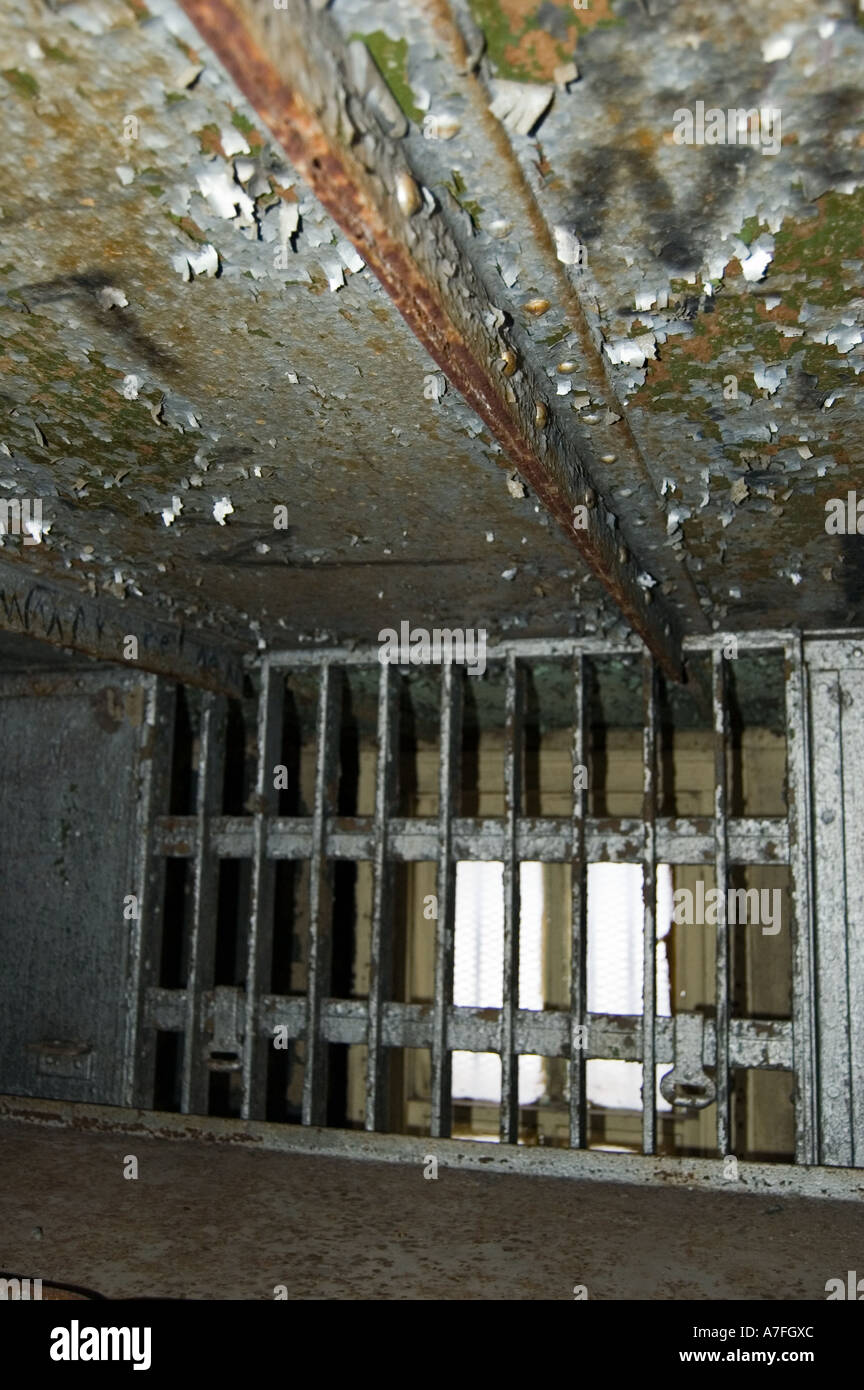 Grafitti and pealing paint in old jail cell ceiling Stock Photo - Alamy