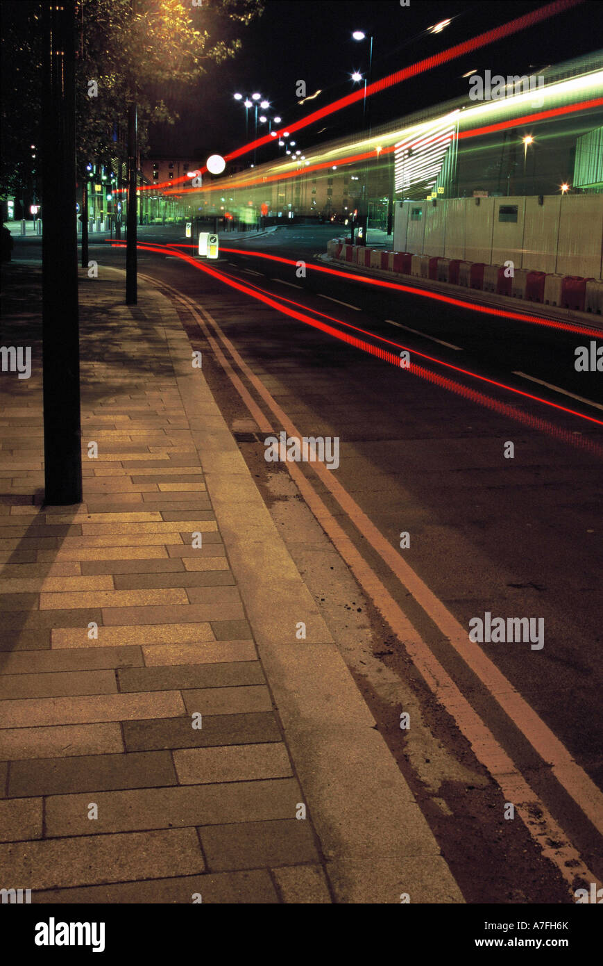 Bus light trails at night Stock Photo - Alamy