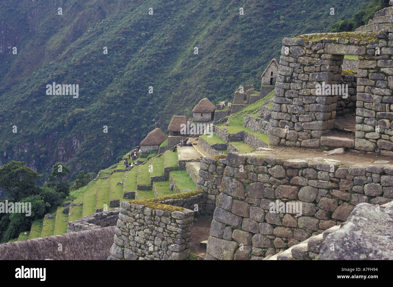 South America, Peru, Machu Picchu. Stone walls and terraces of ruin ...