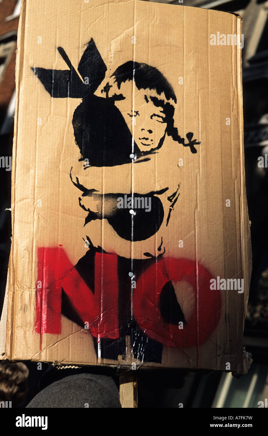 Stop the war demonstration Placard featuring stenciled drawing by ...