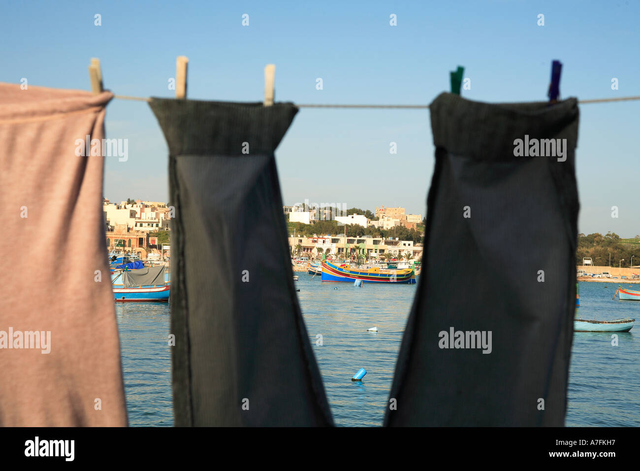 Washing line in Marsaxlokk Malta Stock Photo - Alamy