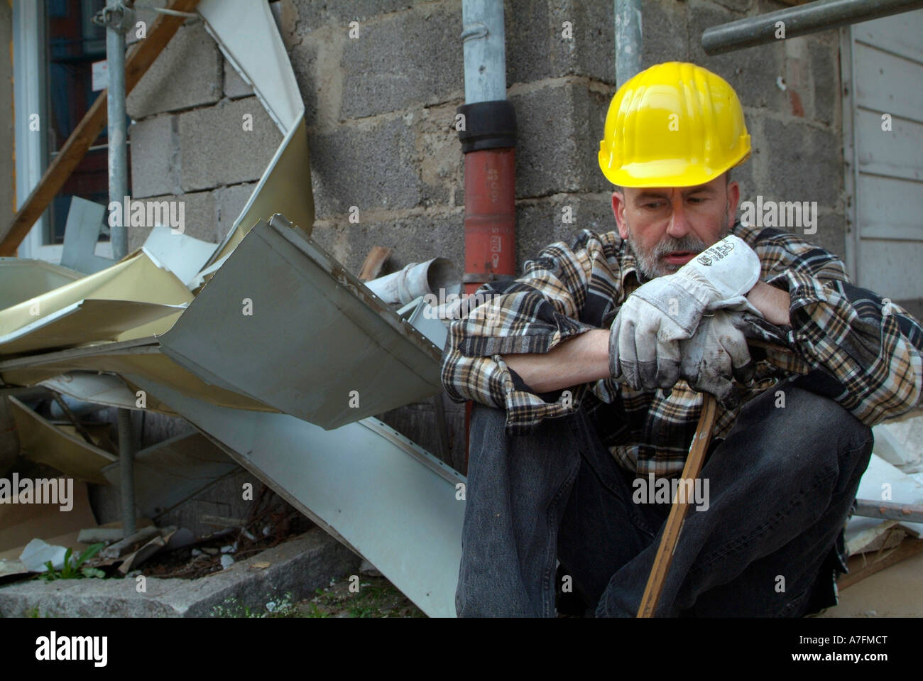 MR worker at building site having a break pause Stock Photo - Alamy