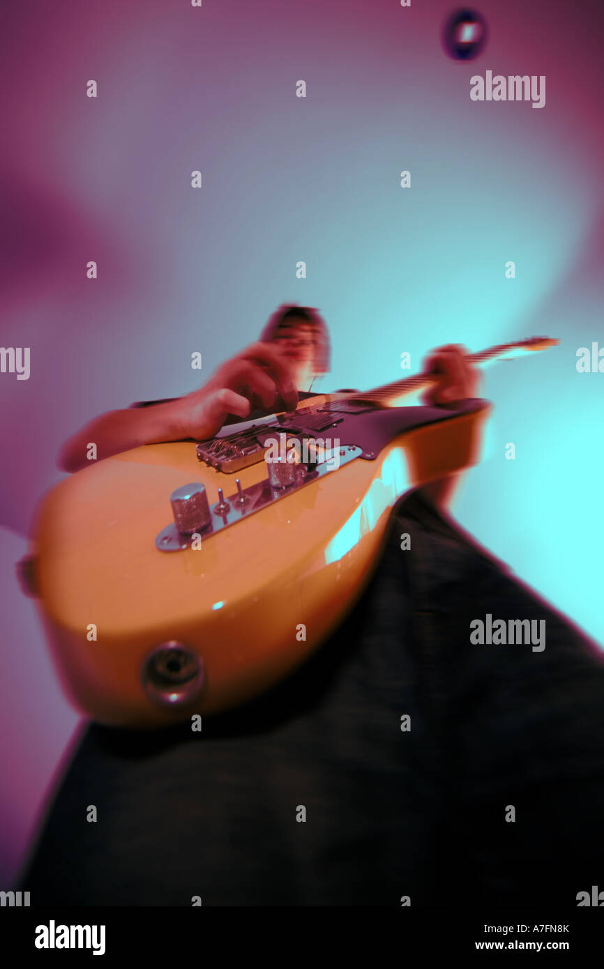 14 year old teenage boy playing punk rock on a vintage blonde fender ...