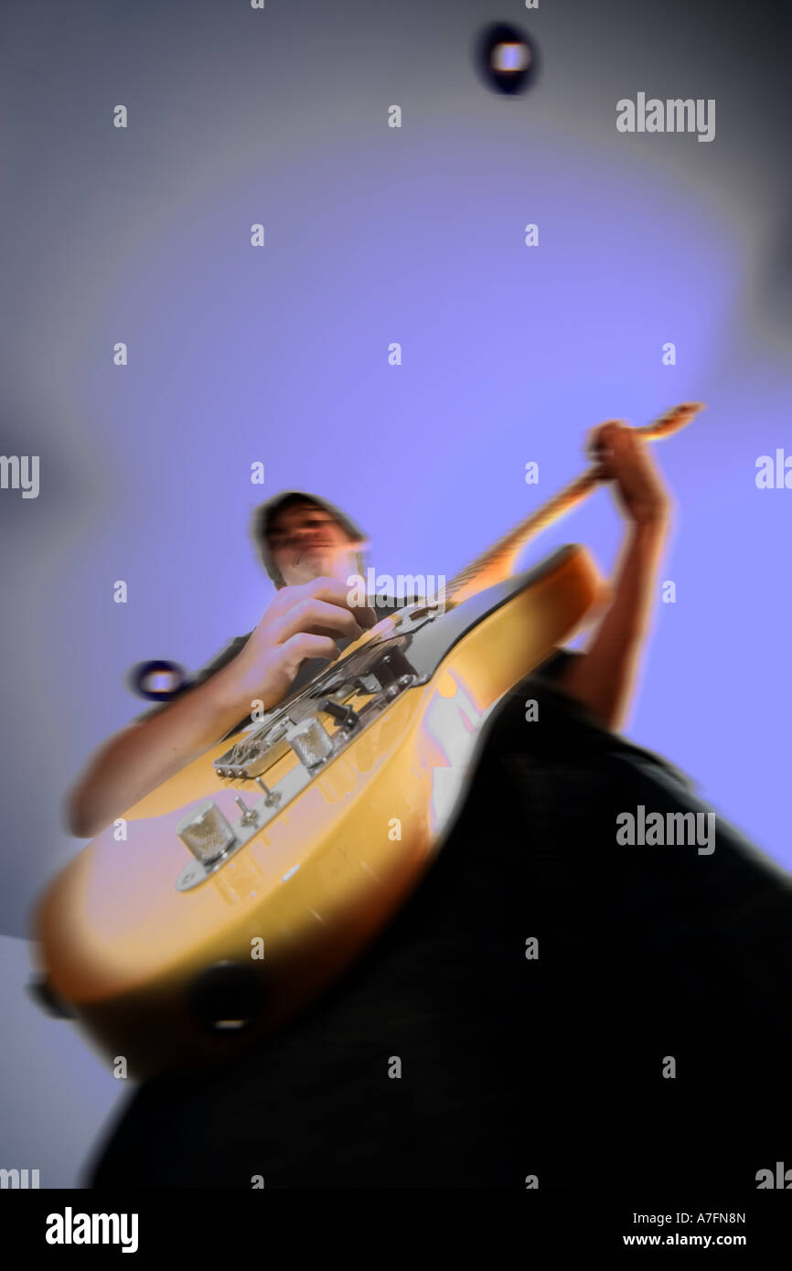 14 year old teenage boy playing punk rock on a vintage blonde fender ...