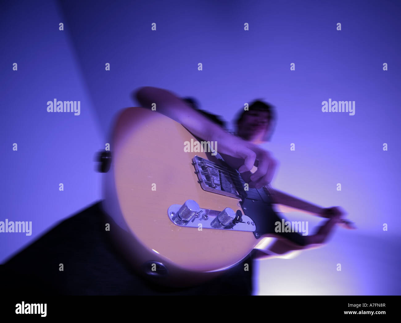 14 year old teenage boy playing punk rock on a vintage blonde fender ...