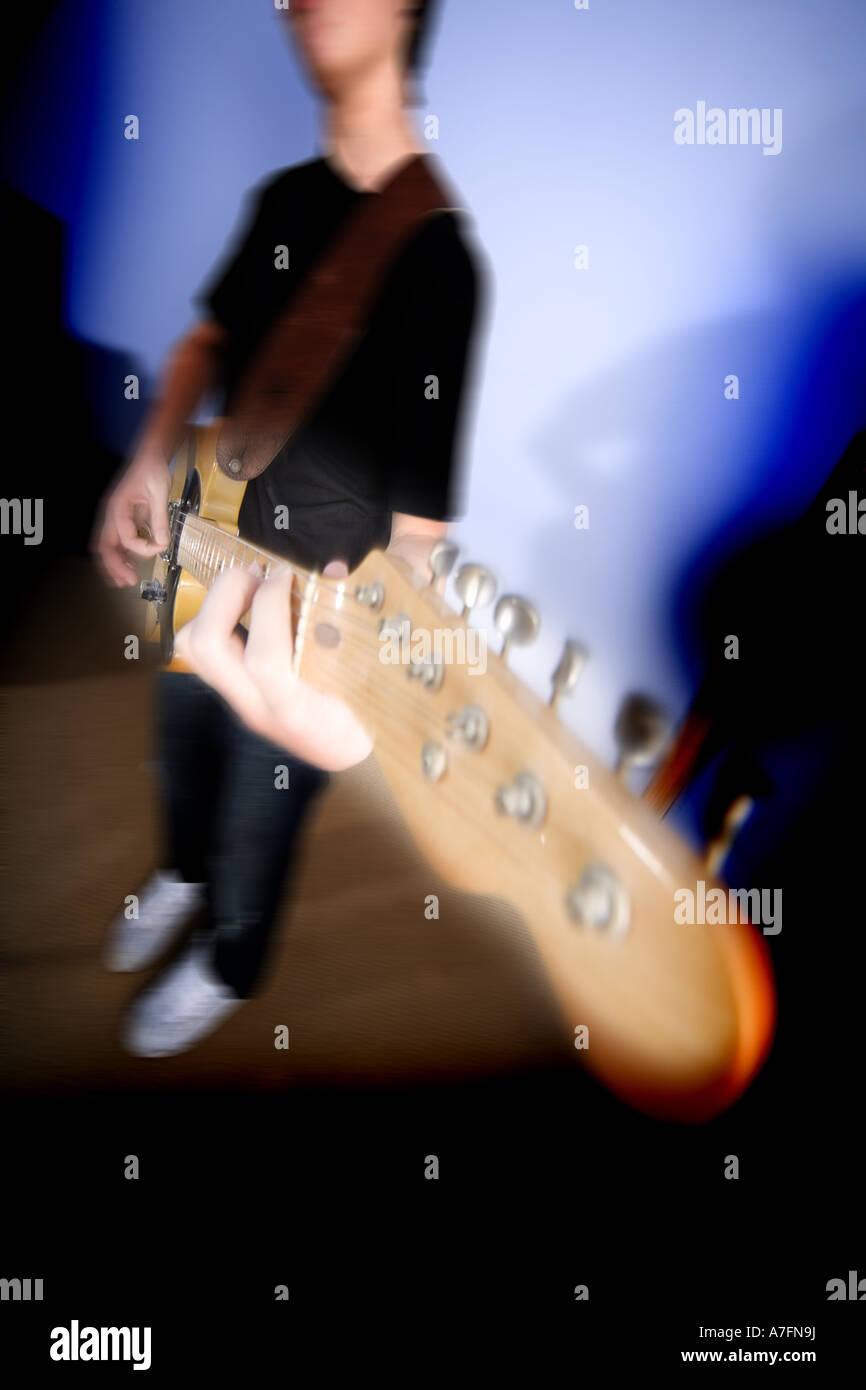 14 year old teenage boy playing punk rock on a vintage blonde fender ...