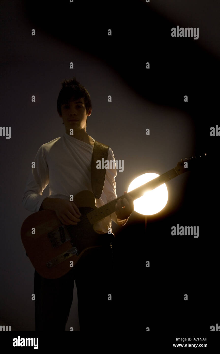 14 year old teenage boy playing punk rock on a vintage blonde fender ...