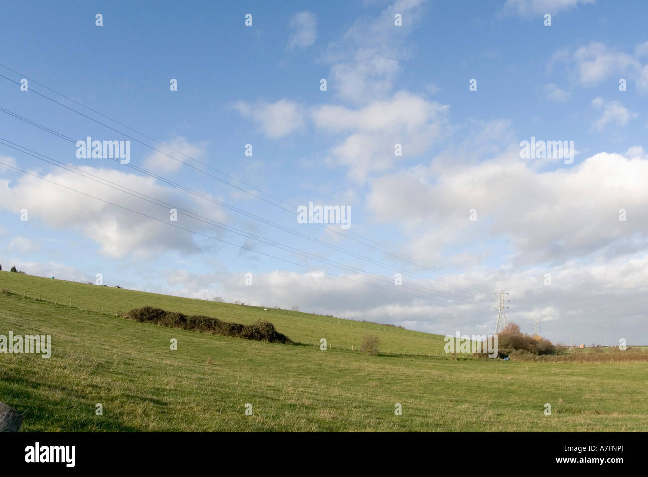 pylons across countryside Stock Photo - Alamy