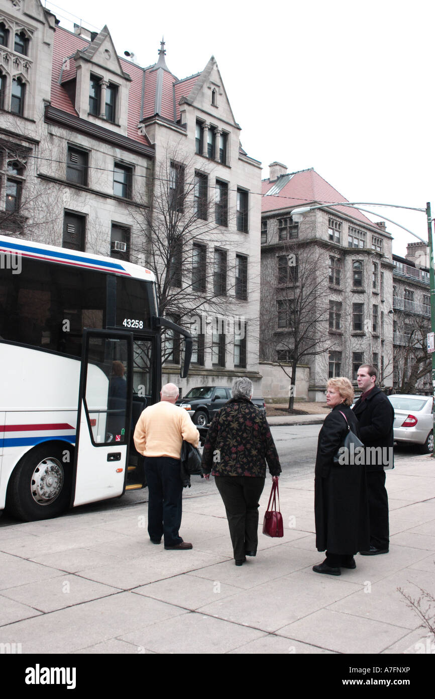 People getting on a bus in Hyde Park Chicago Illinois Stock Photo - Alamy