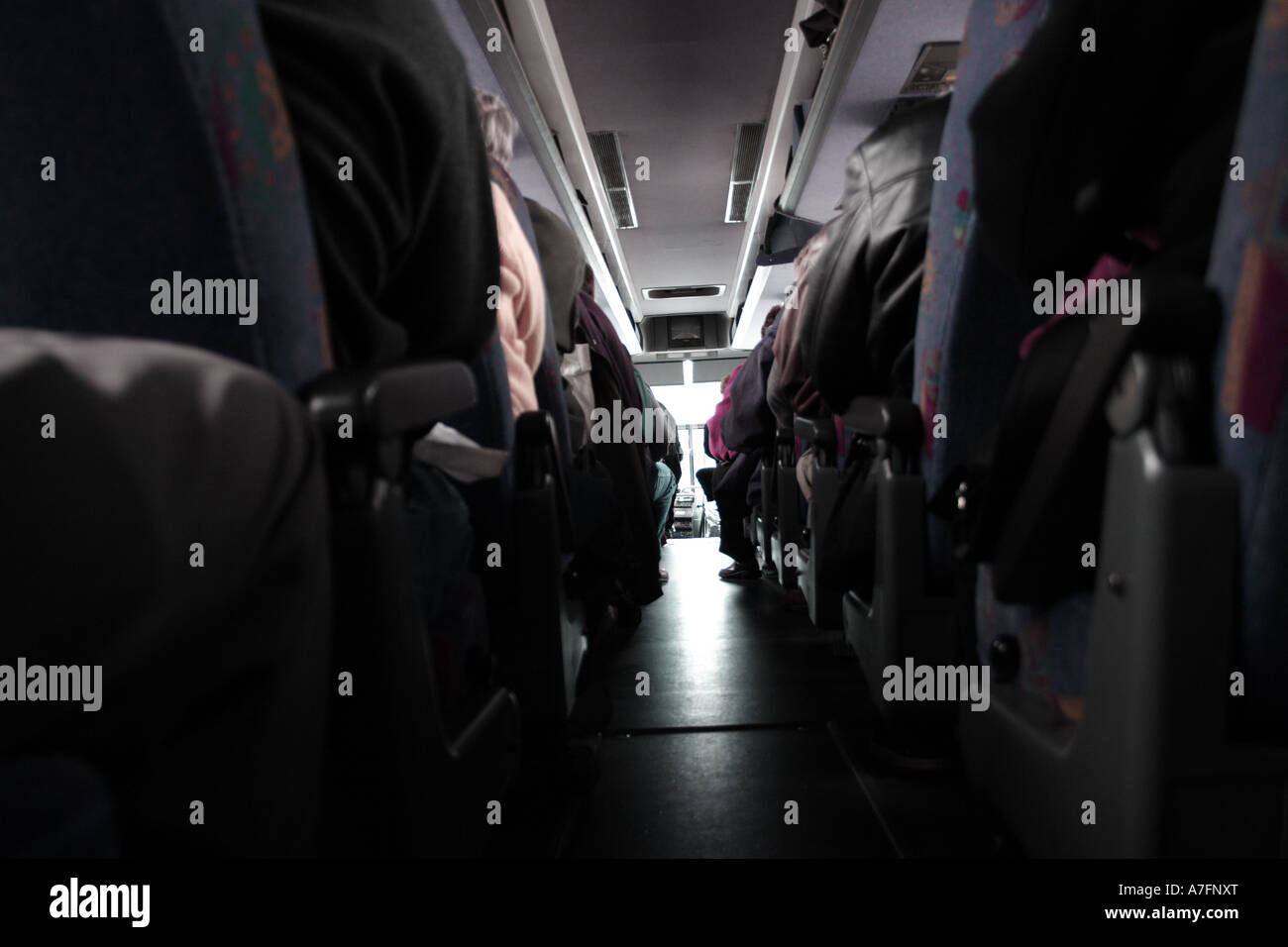 Interior of a bus with passengers Stock Photo - Alamy